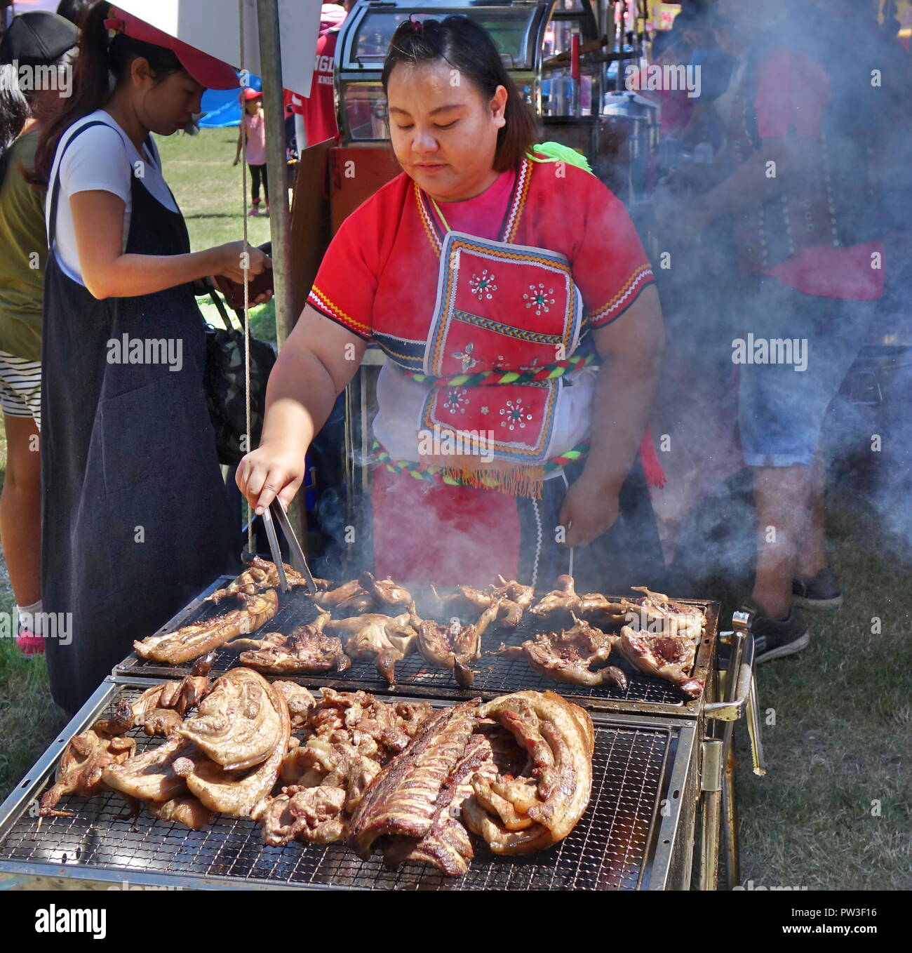 KAOHSIUNG, TAIWAN -- SEPTEMBER 29, 2018: A member of the indigenous ...
