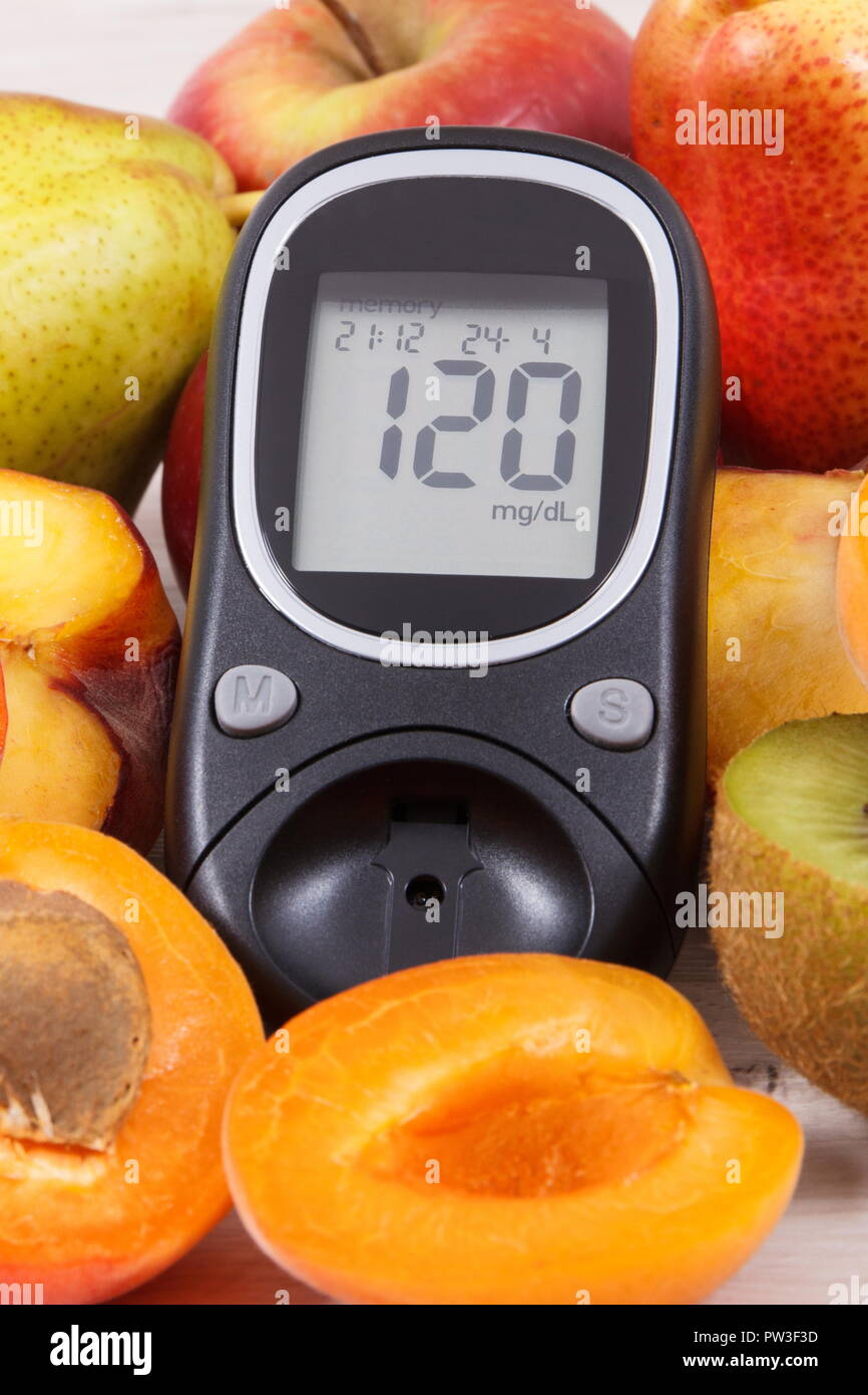 Glucometer for checking sugar level and fresh healthy nutritious food ...
