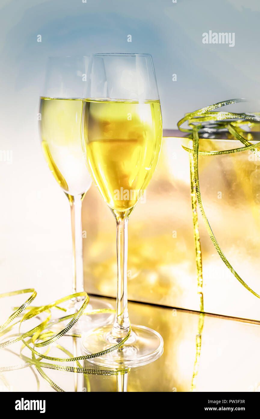 Two glasses of wine and a box with a ribbon on white background Stock ...