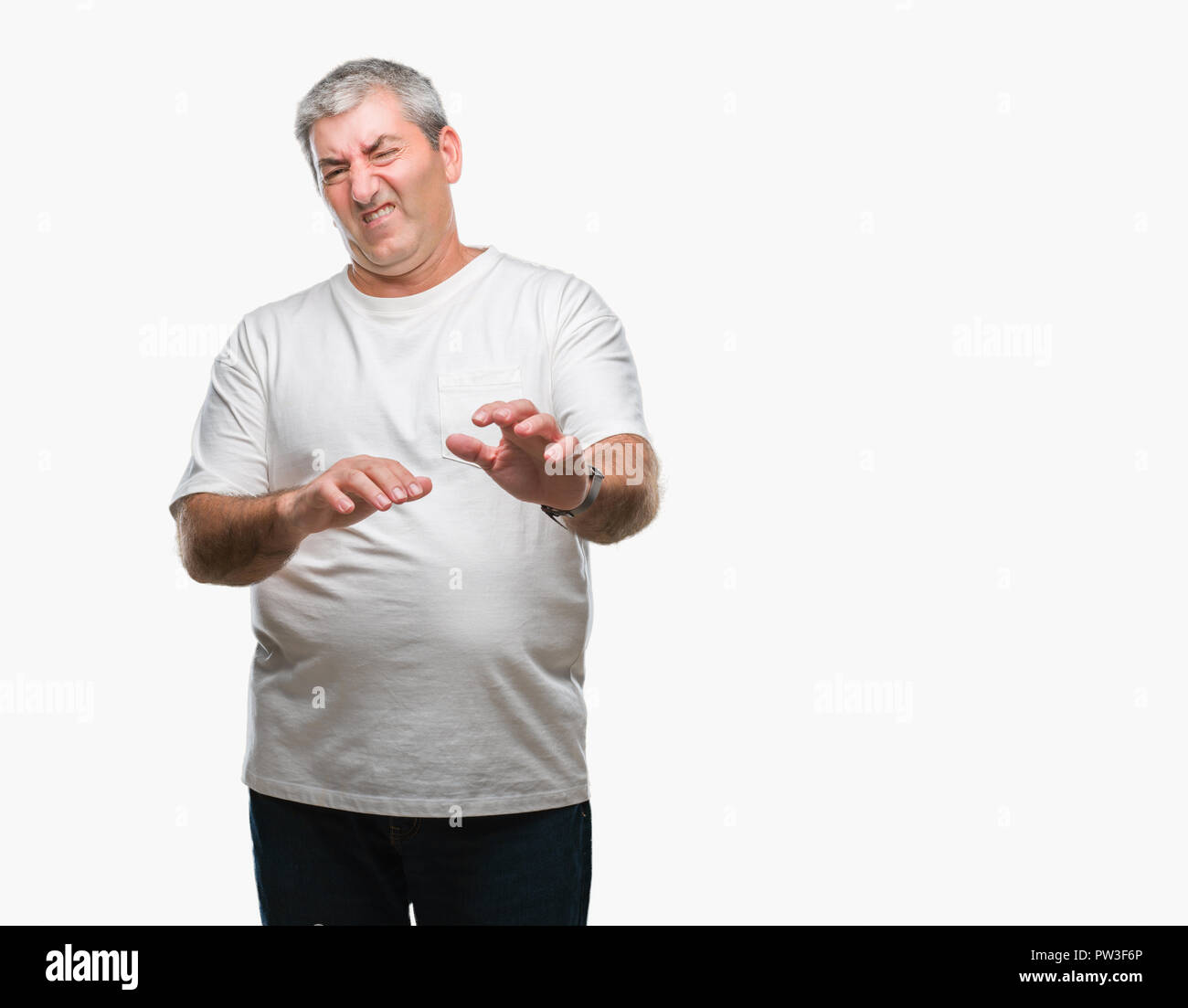 Handsome senior man over isolated background disgusted expression ...