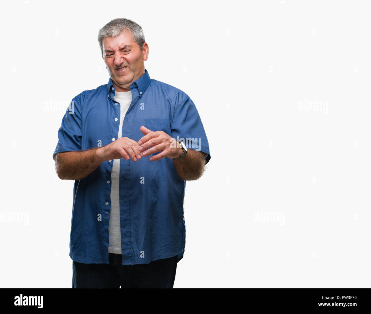 Handsome senior man over isolated background disgusted expression ...