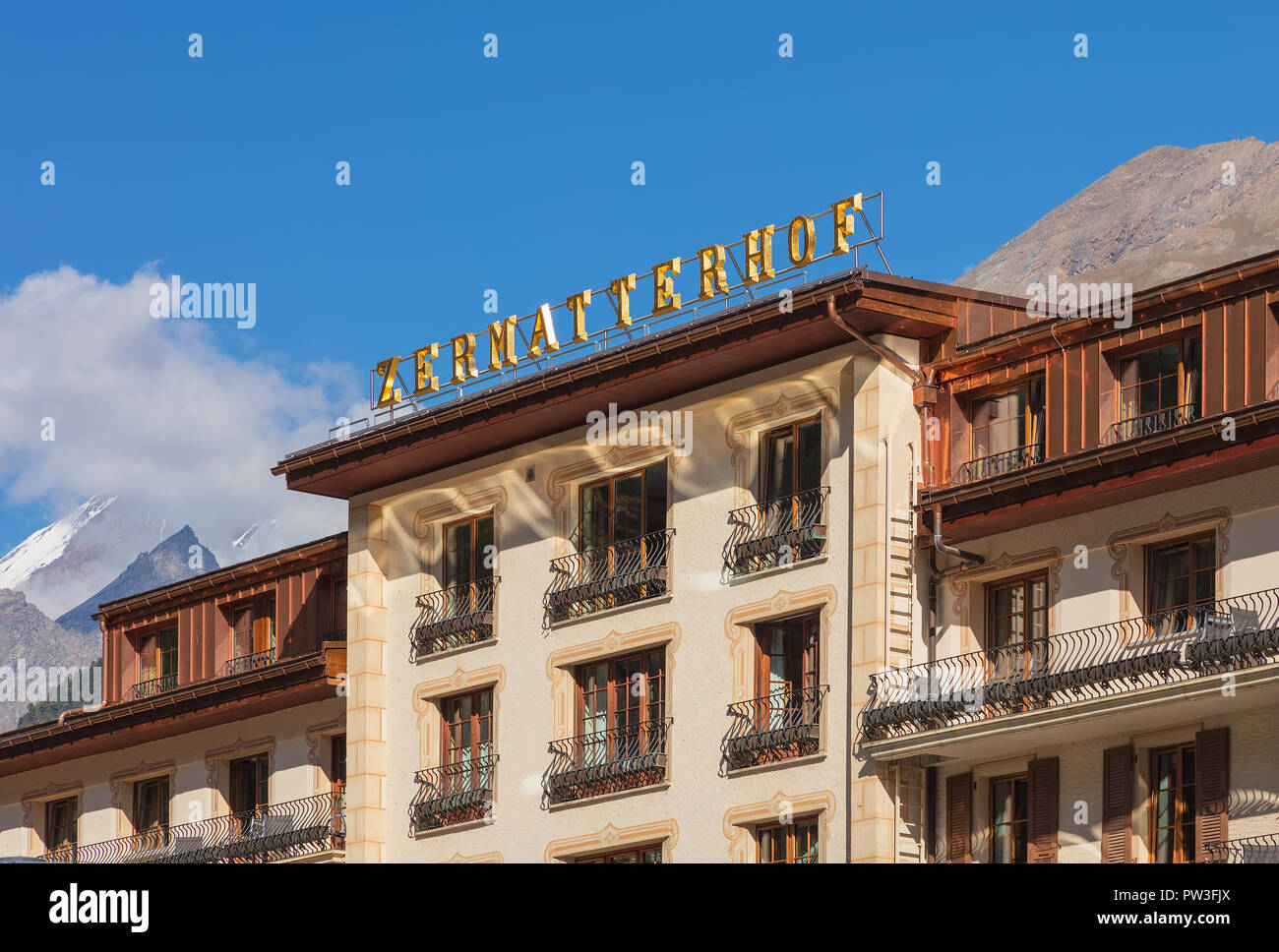 Upper part of the building of the Grand Hotel Zermatterhof in the town ...