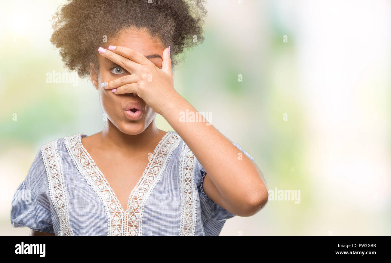 Hand over eyes peeking woman hi-res stock photography and images - Alamy