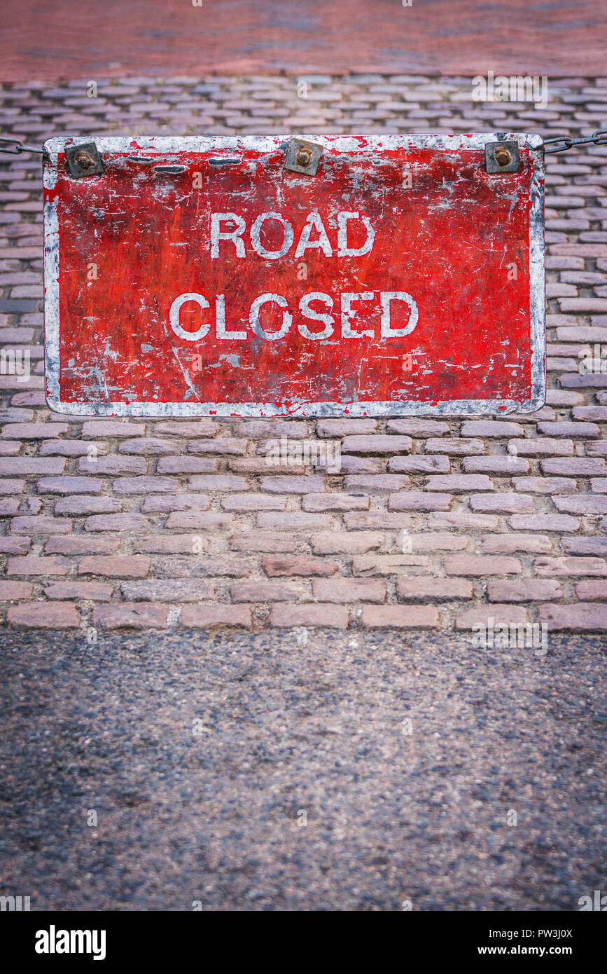 Red sign board indicating that the road ahead is closed Stock Photo - Alamy