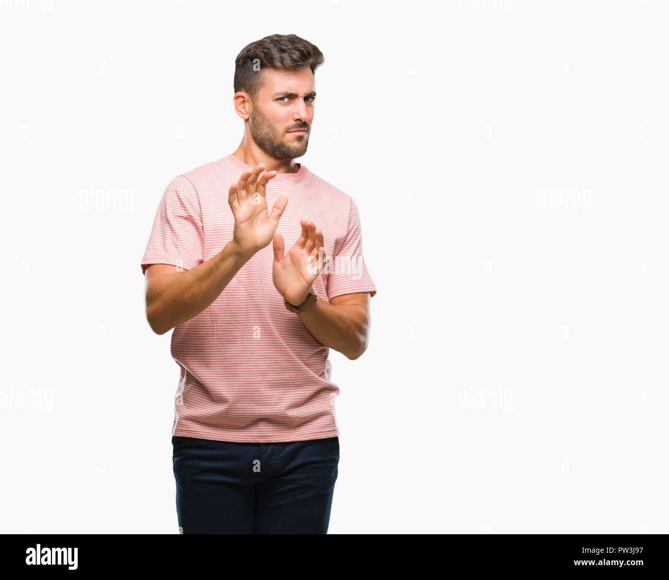 Young handsome man over isolated background disgusted expression ...