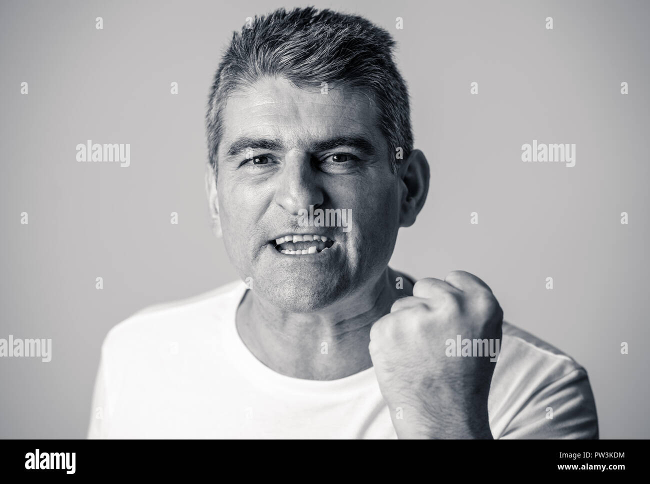 Portrait of a mature 40s to 50s white angry and upset man looking ...