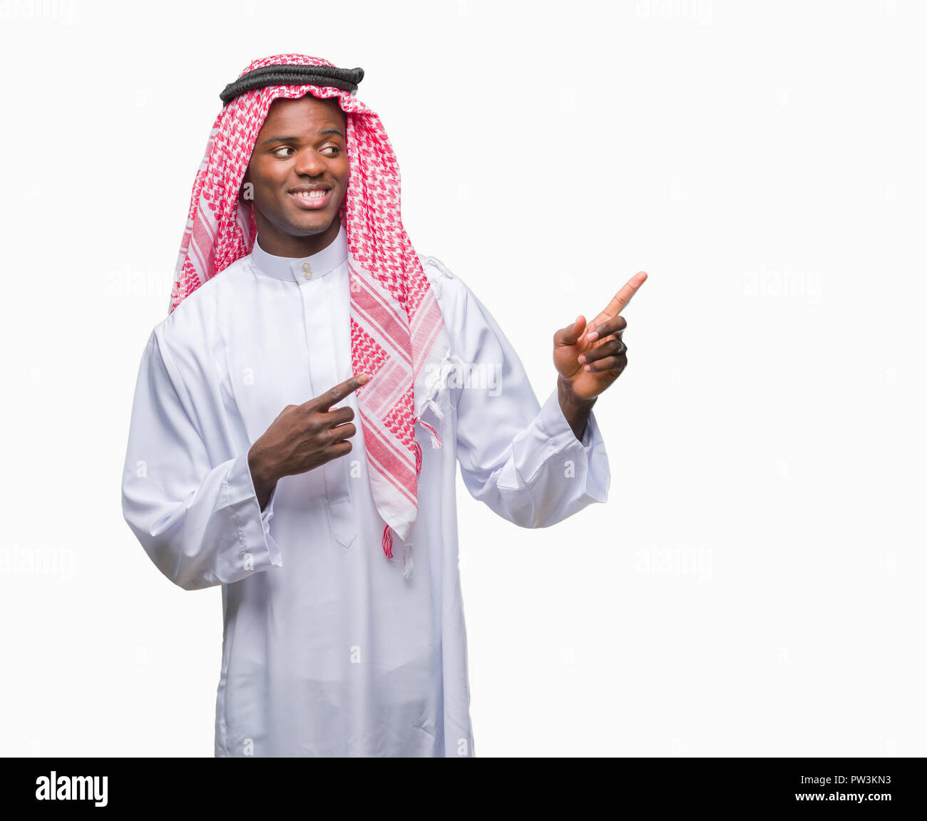 Young arabic african man wearing traditional keffiyeh over isolated ...