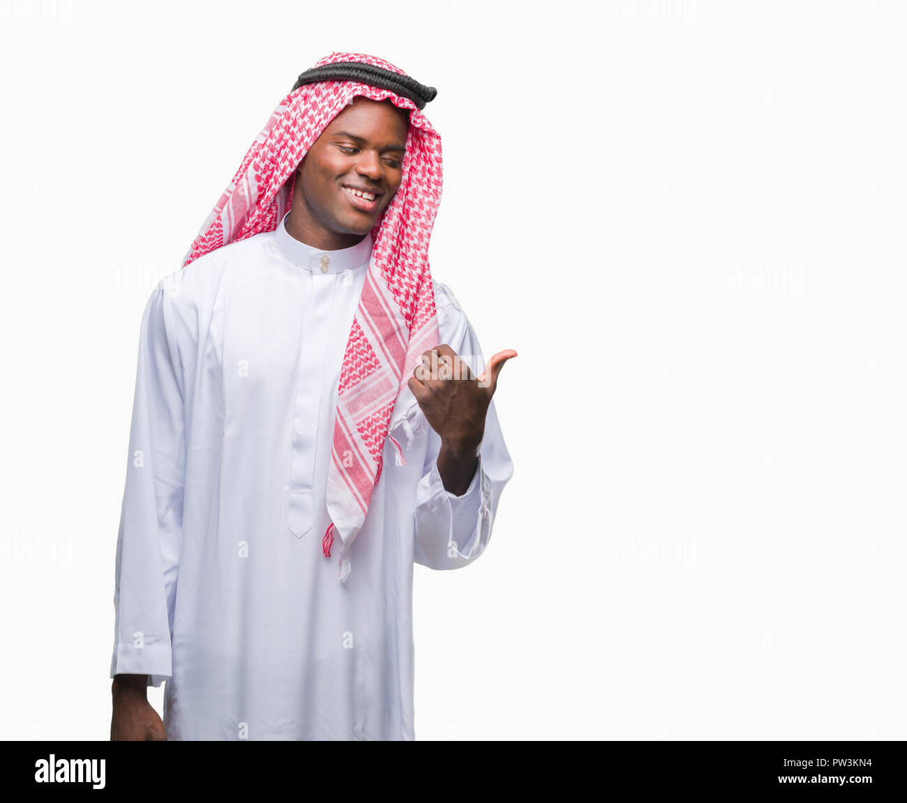 Young arabic african man wearing traditional keffiyeh over isolated ...