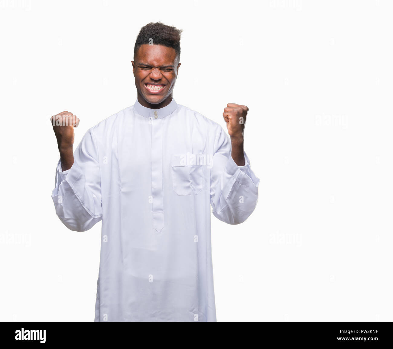 Young arabic african man wearing traditional djellaba over isolated ...