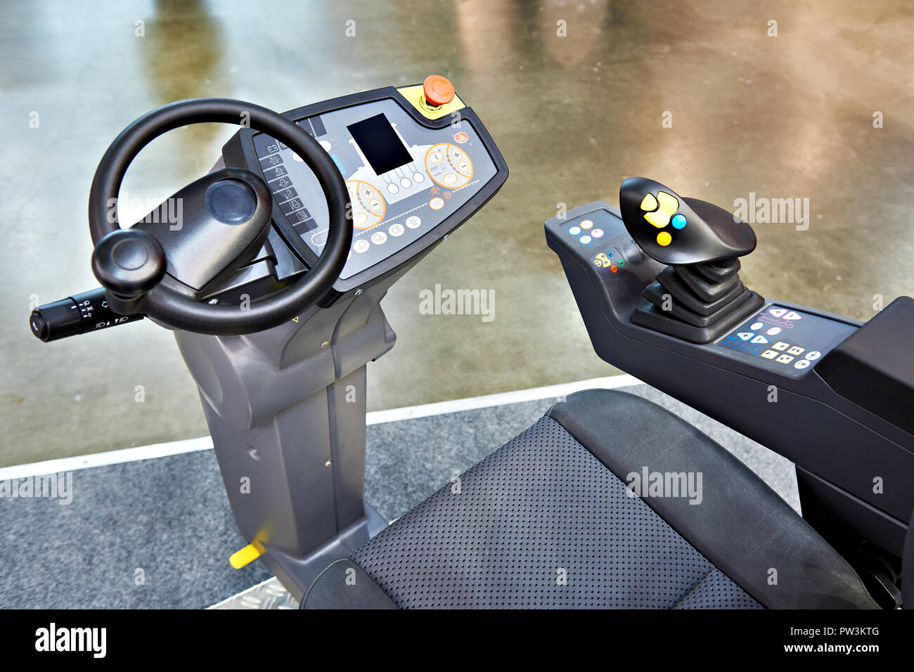 Chair excavator operator with steering wheel and joystick Stock Photo ...