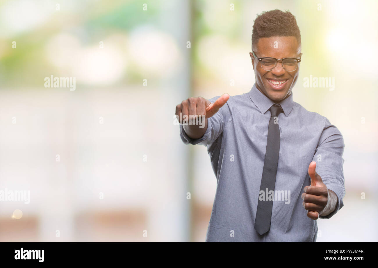 Young african american business man over isolated background approving ...