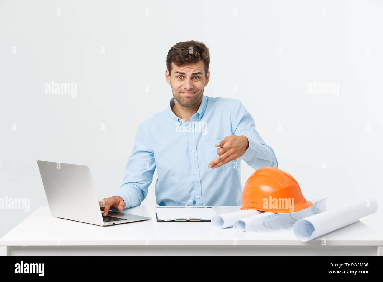 Handsome young man serious working in engineering office Stock Photo ...