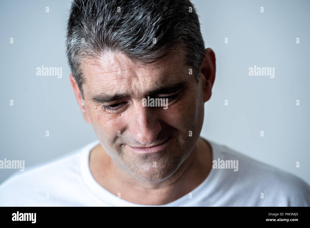 Portrait of an attractive man sad an depressed suffering depression ...