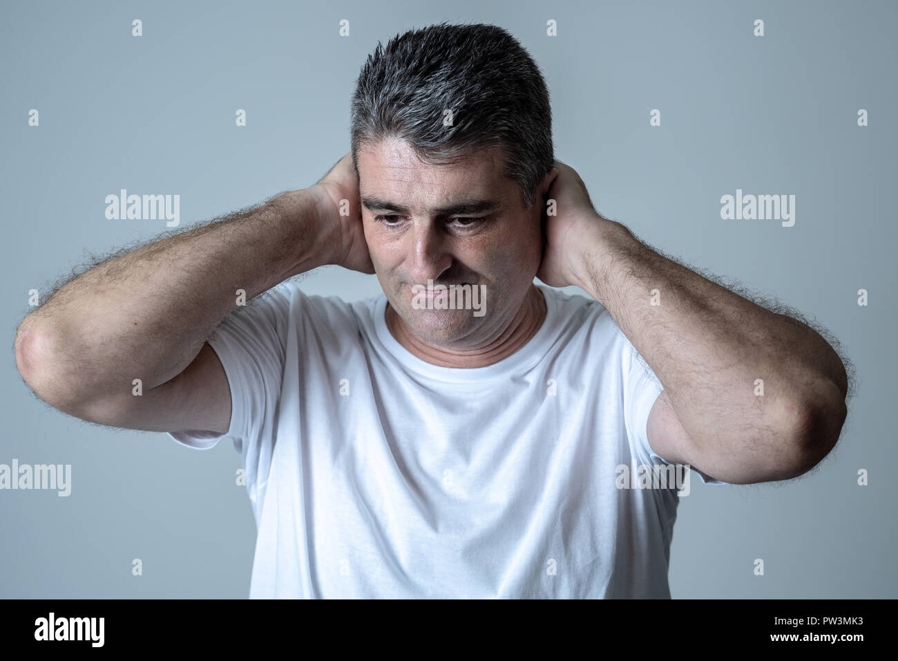 Portrait of an attractive man sad an depressed suffering depression ...