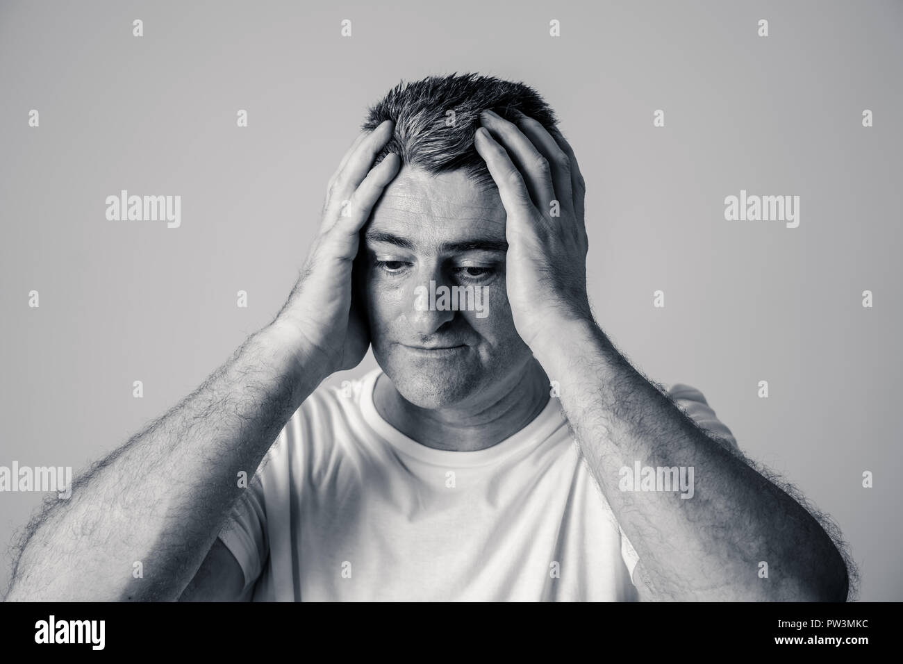 Portrait of an attractive man sad an depressed suffering depression ...