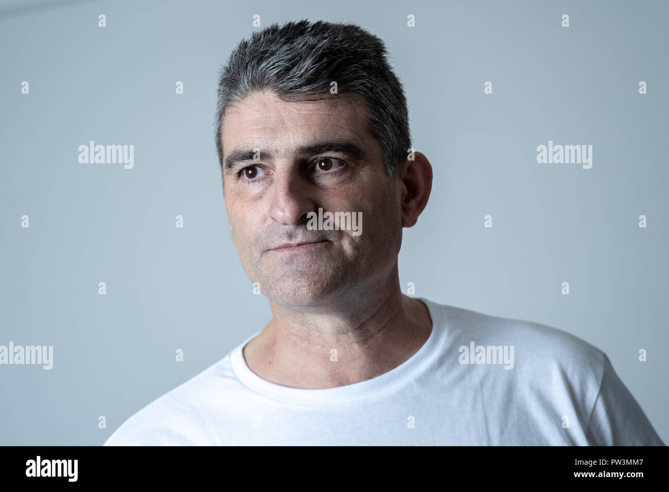 Portrait of an attractive man sad an depressed suffering depression ...