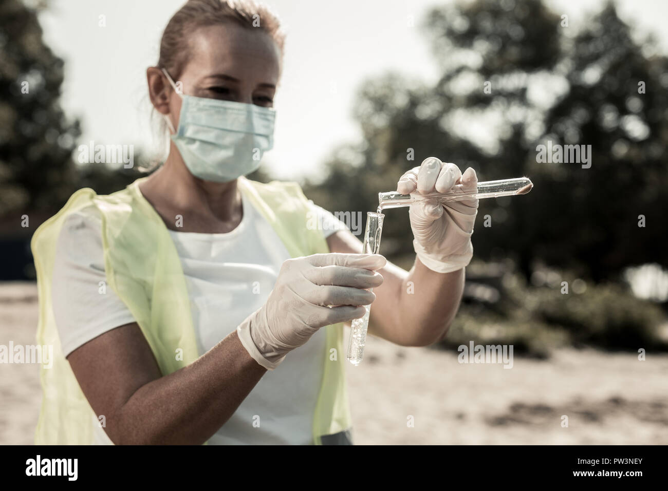 Worker of sanitary service feeling disturbed checking water ...