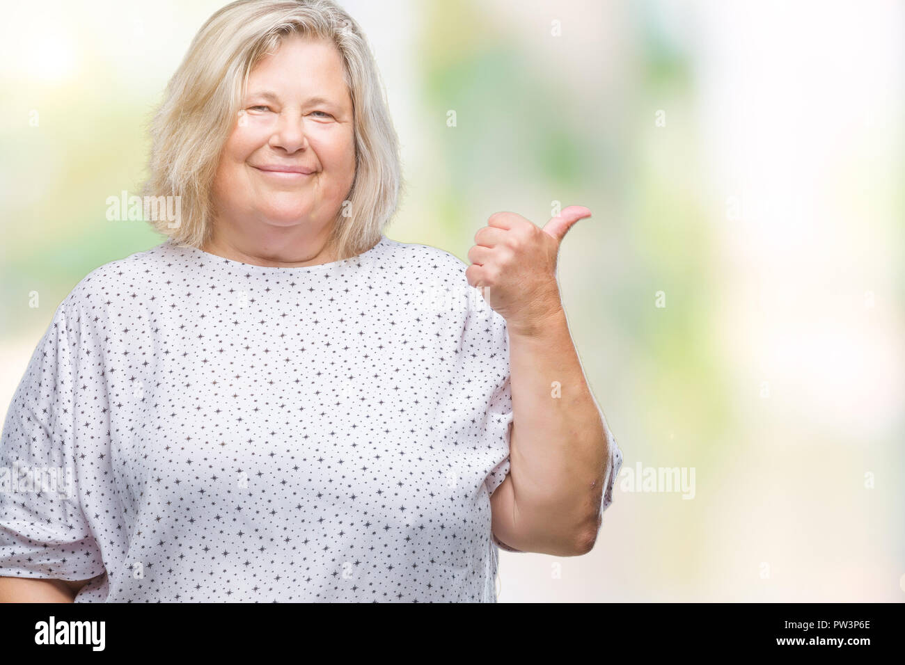 Senior plus size caucasian woman over isolated background smiling with ...