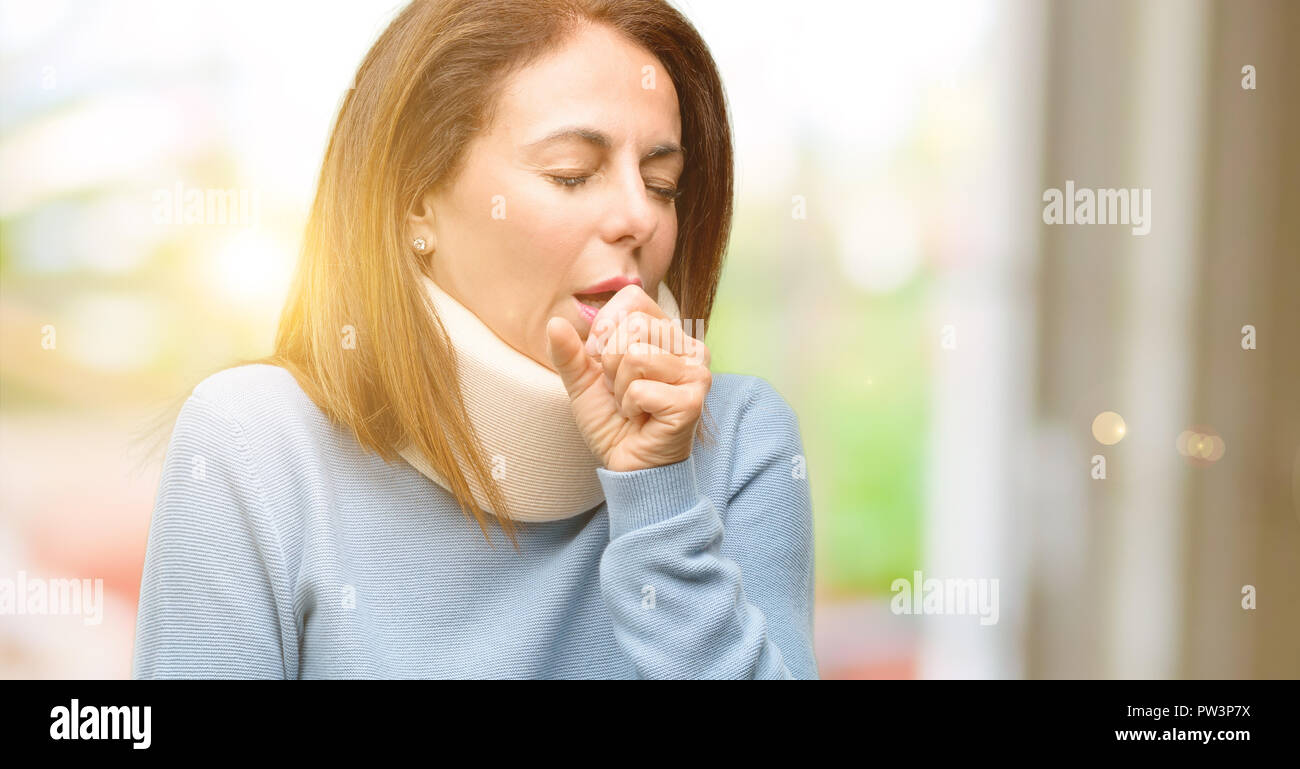 Injured woman wearing neck brace collar sick and coughing, suffering ...