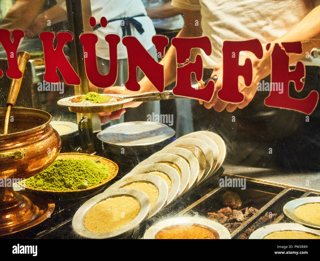 Kunefe, also known as Kenafeh, a traditional Arab dessert made with ...
