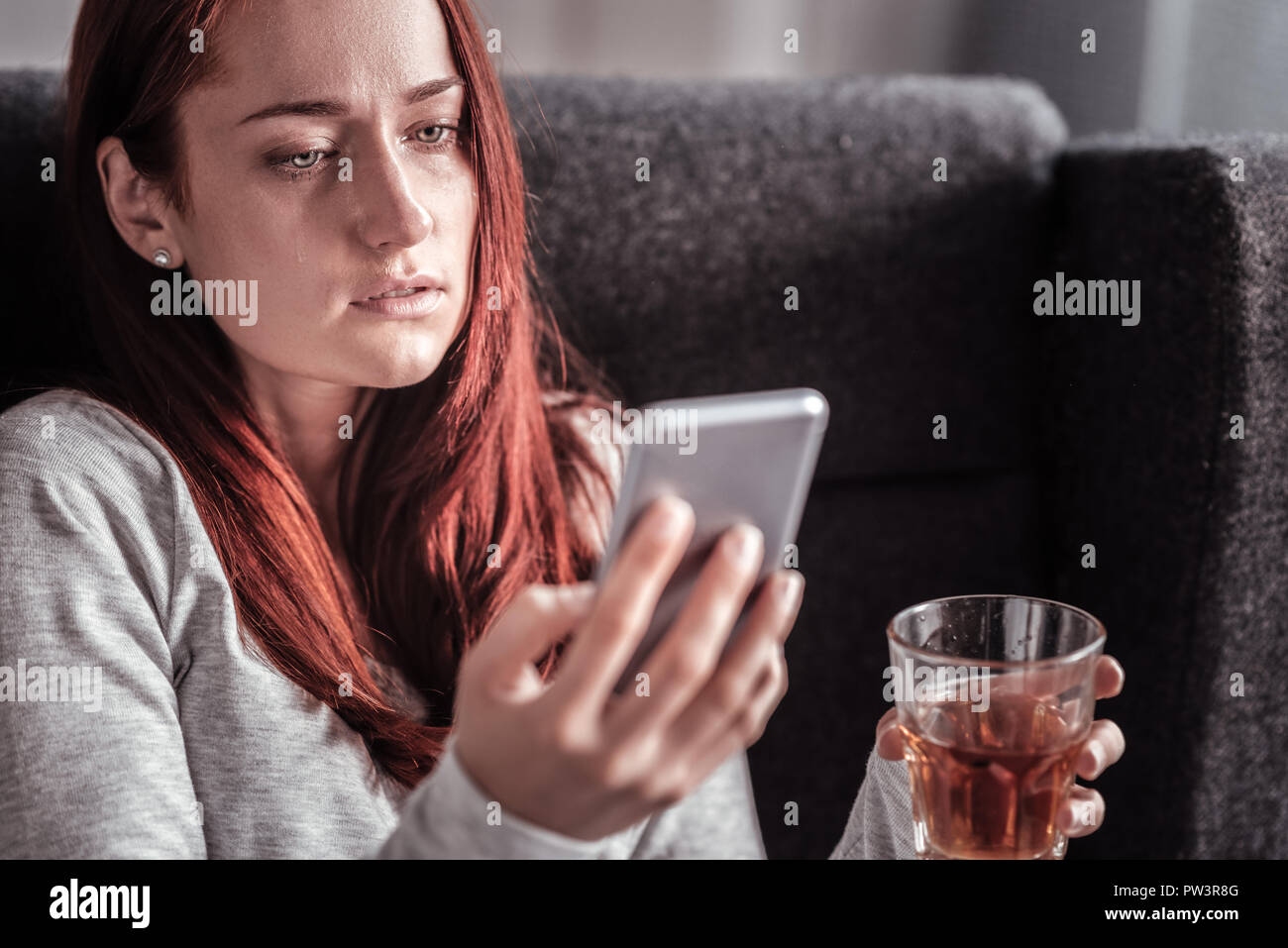 Unhappy female feeling regret suffering hi-res stock photography and ...