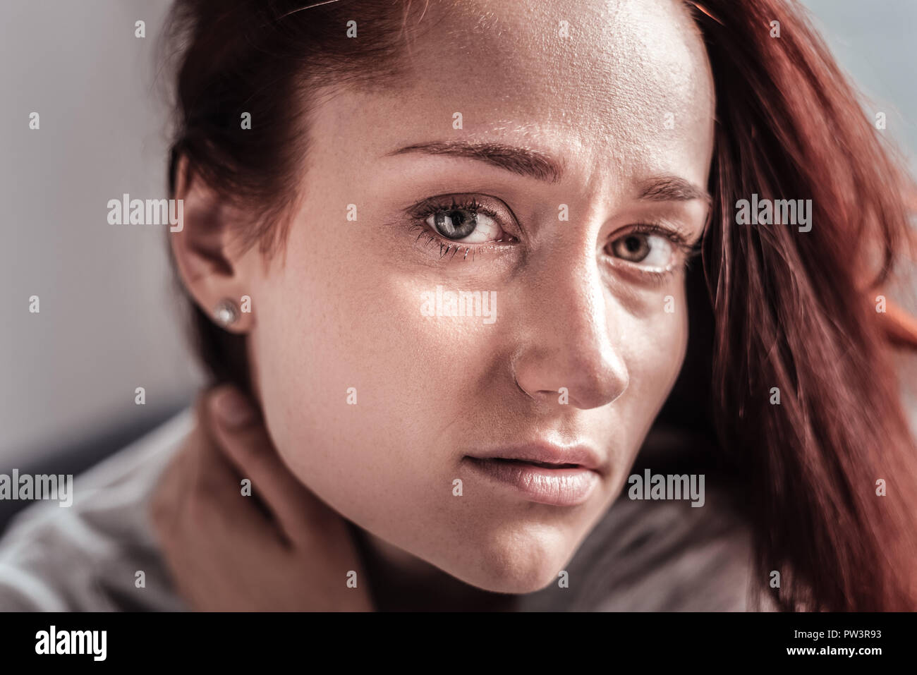Portrait of a moody young woman Stock Photo - Alamy