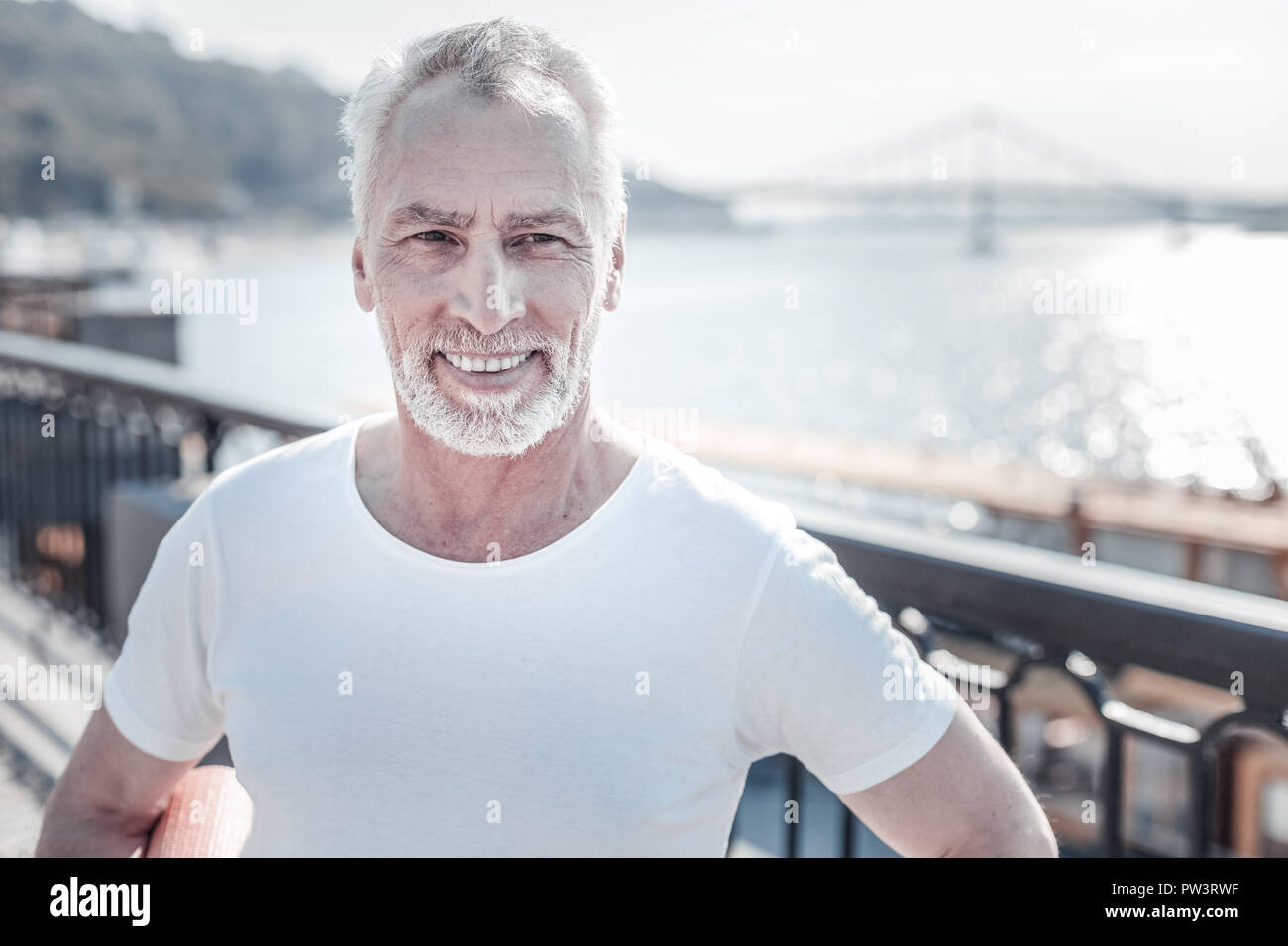 Positive delighted male person enjoying nature Stock Photo - Alamy