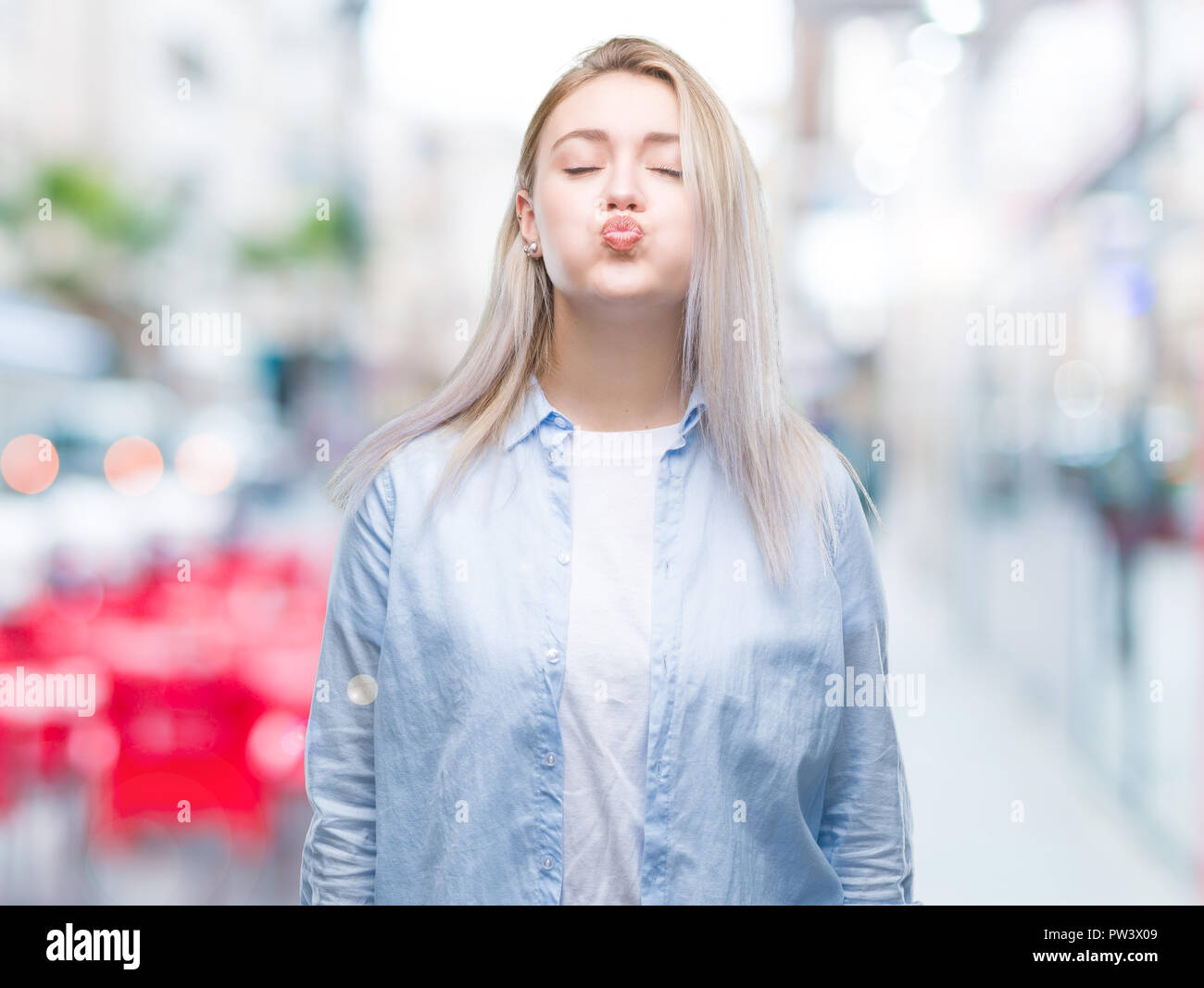 Puffed lips hi-res stock photography and images - Alamy