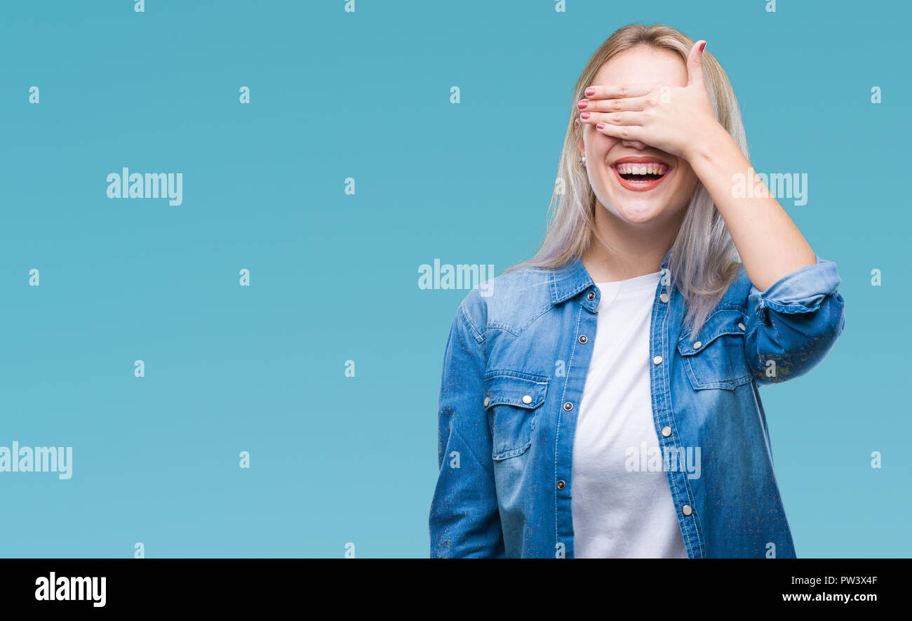 Woman Laughing Hand Over Mouth Stock Photos & Woman Laughing Hand Over ...