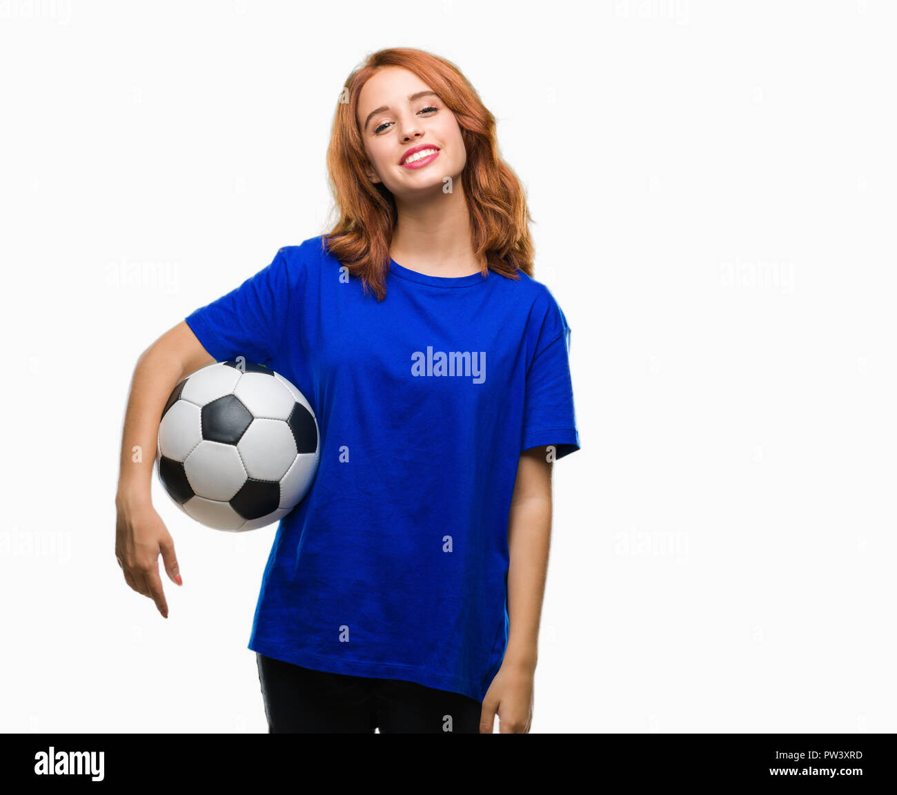 Young beautiful woman over isolated background holding soccer football ...