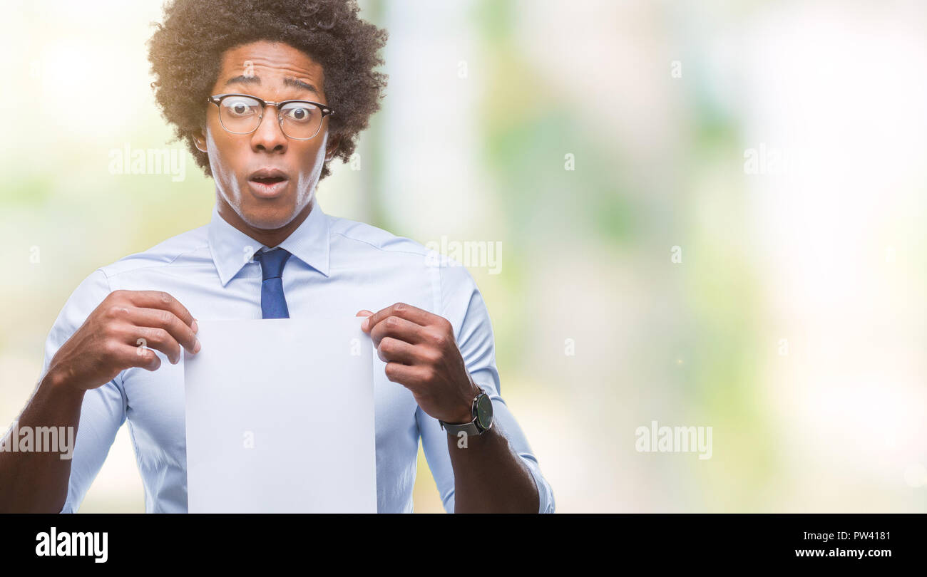 Afro american man holding blank paper contract over isolated background ...