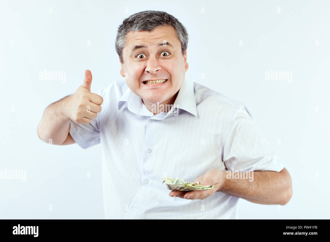 Man demonstrates money hi-res stock photography and images - Alamy