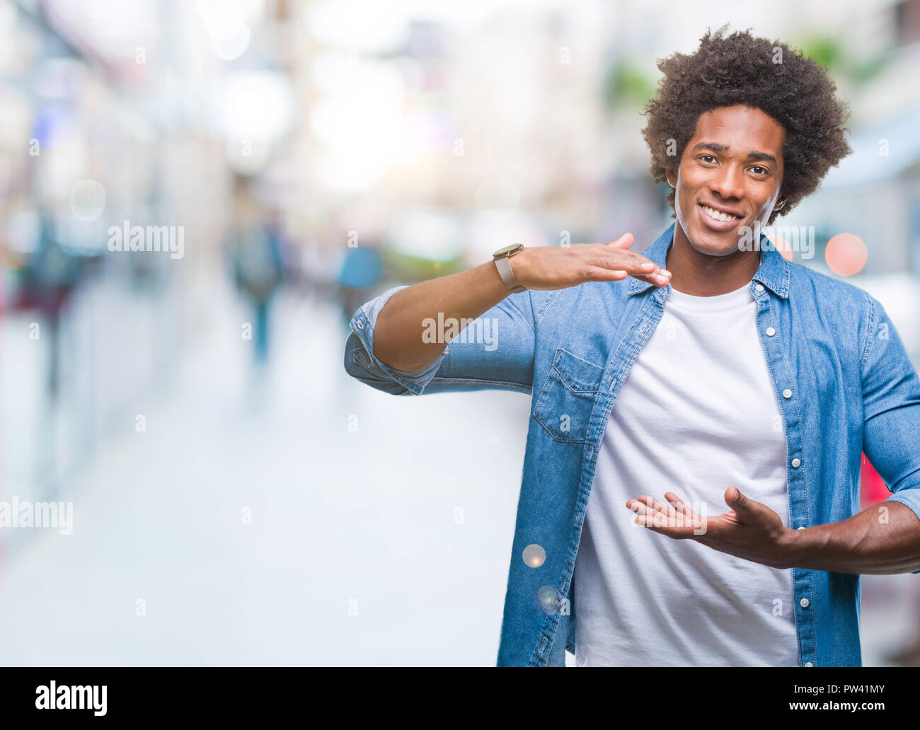 Afro american man over isolated background gesturing with hands showing ...