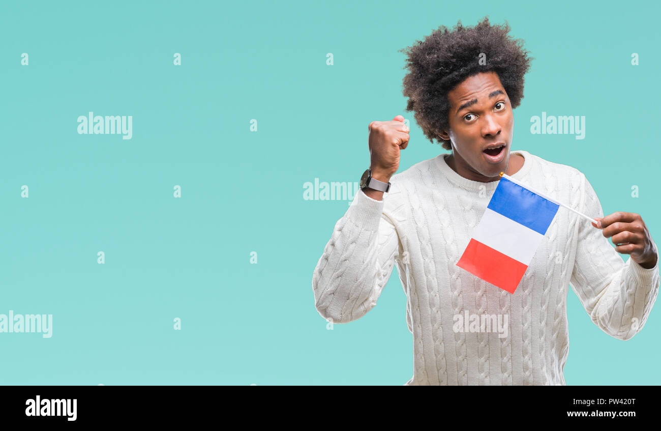 Afro american man flag of France over isolated background annoyed and ...