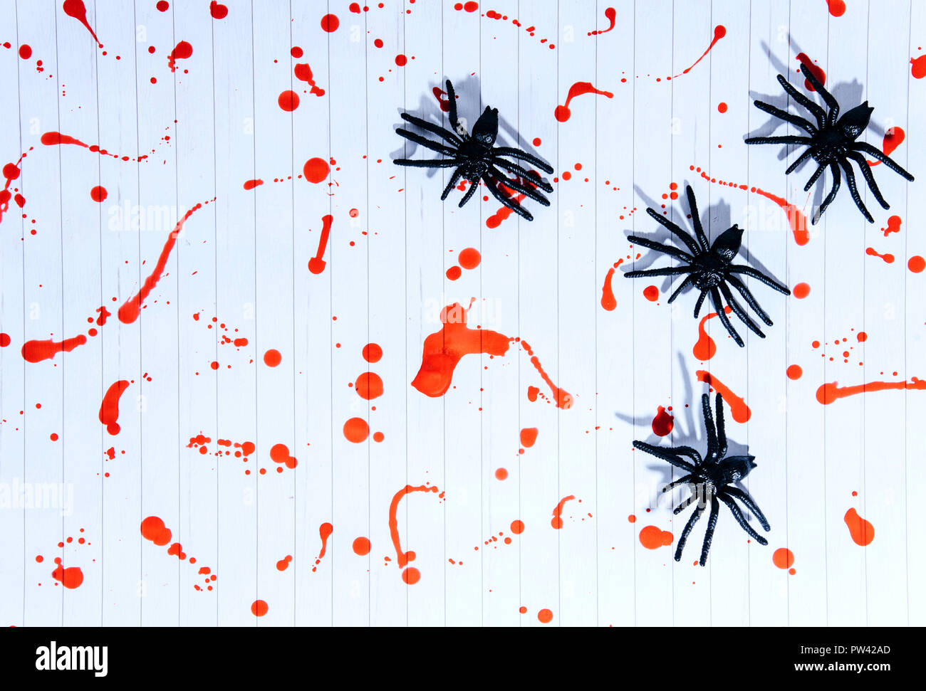 Spiders on a white background covered with blood, Halloween Stock Photo ...