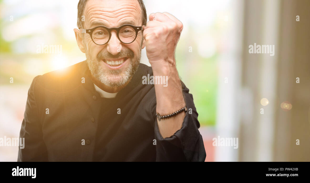 Priest religion man irritated and angry expressing negative emotion ...
