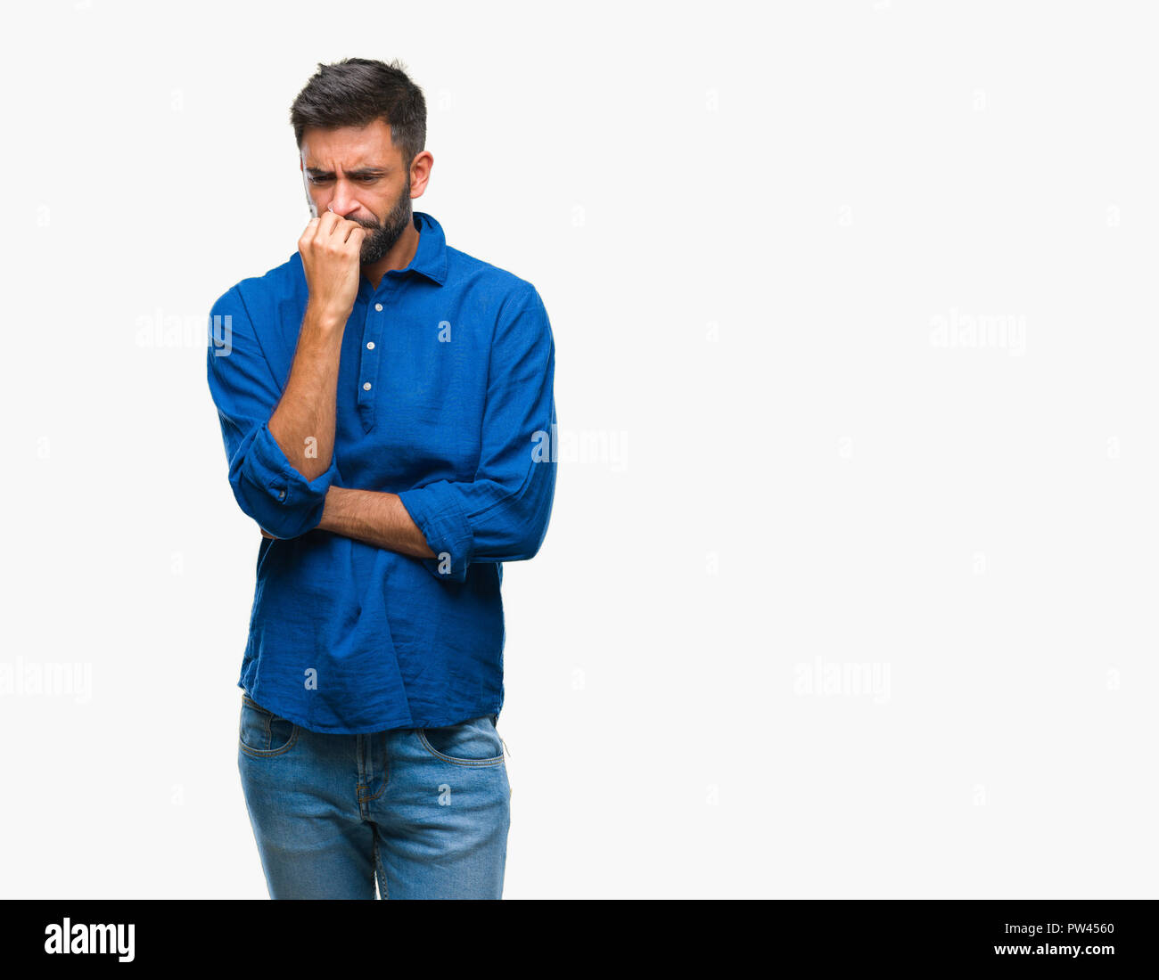 Adult hispanic man over isolated background looking stressed and ...