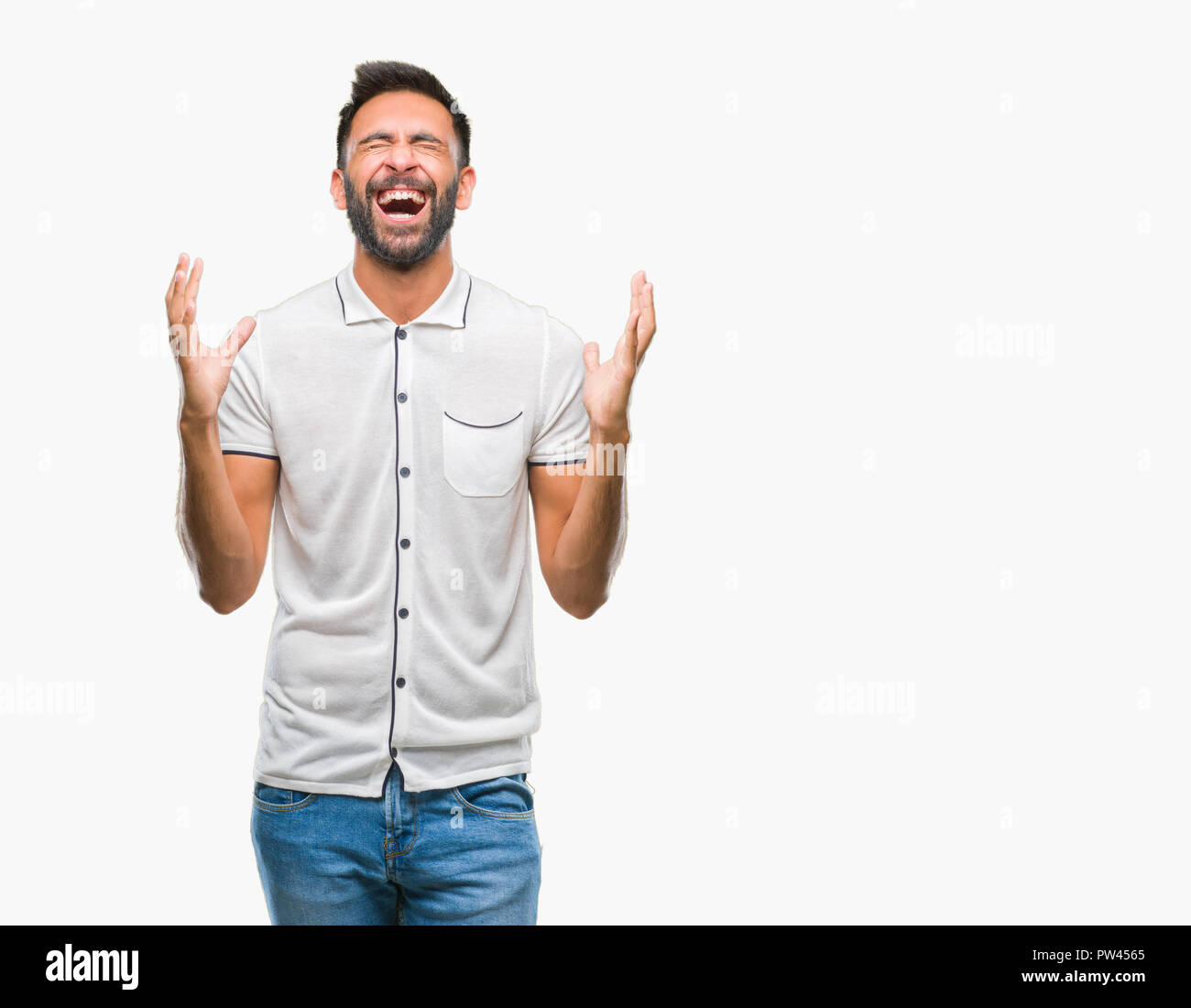 Adult hispanic man over isolated background celebrating mad and crazy ...