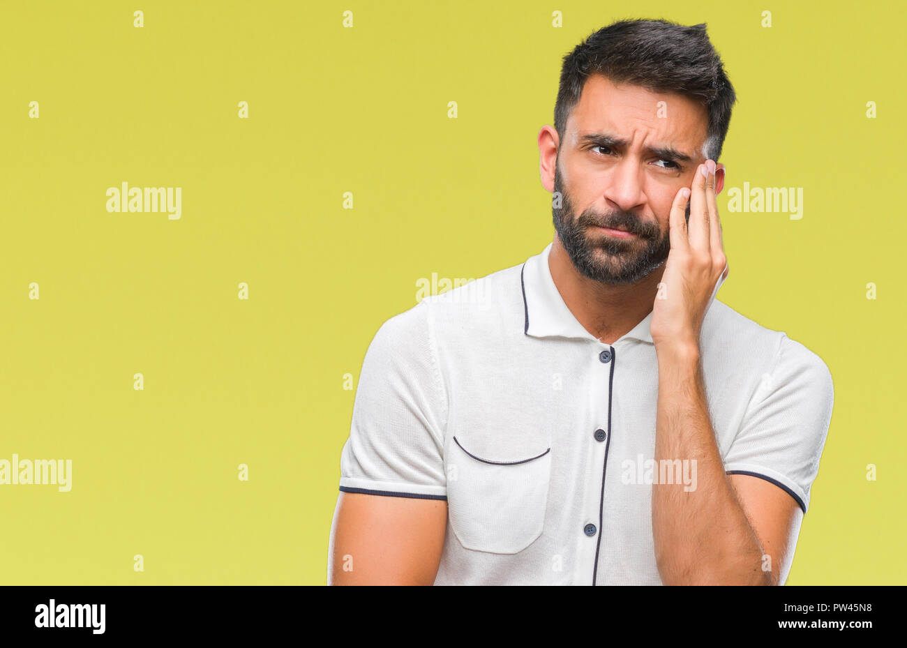 Adult hispanic man over isolated background thinking looking tired and ...