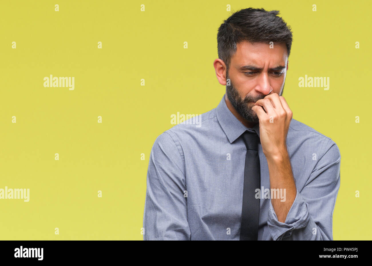 Adult hispanic business man over isolated background looking stressed ...