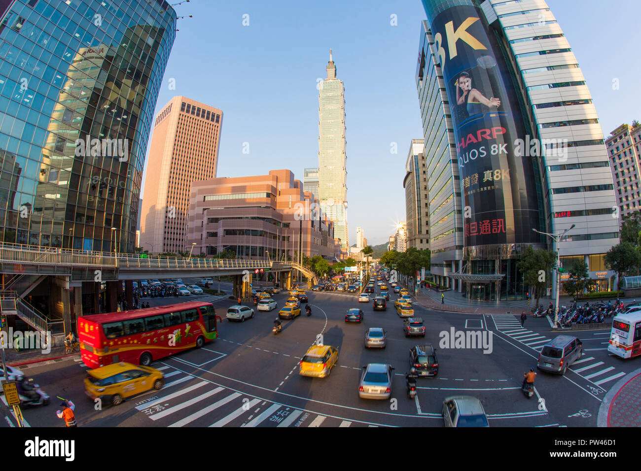 Taiwan, Taipei, traffic in front of Taipei 101 at a busy downtown ...