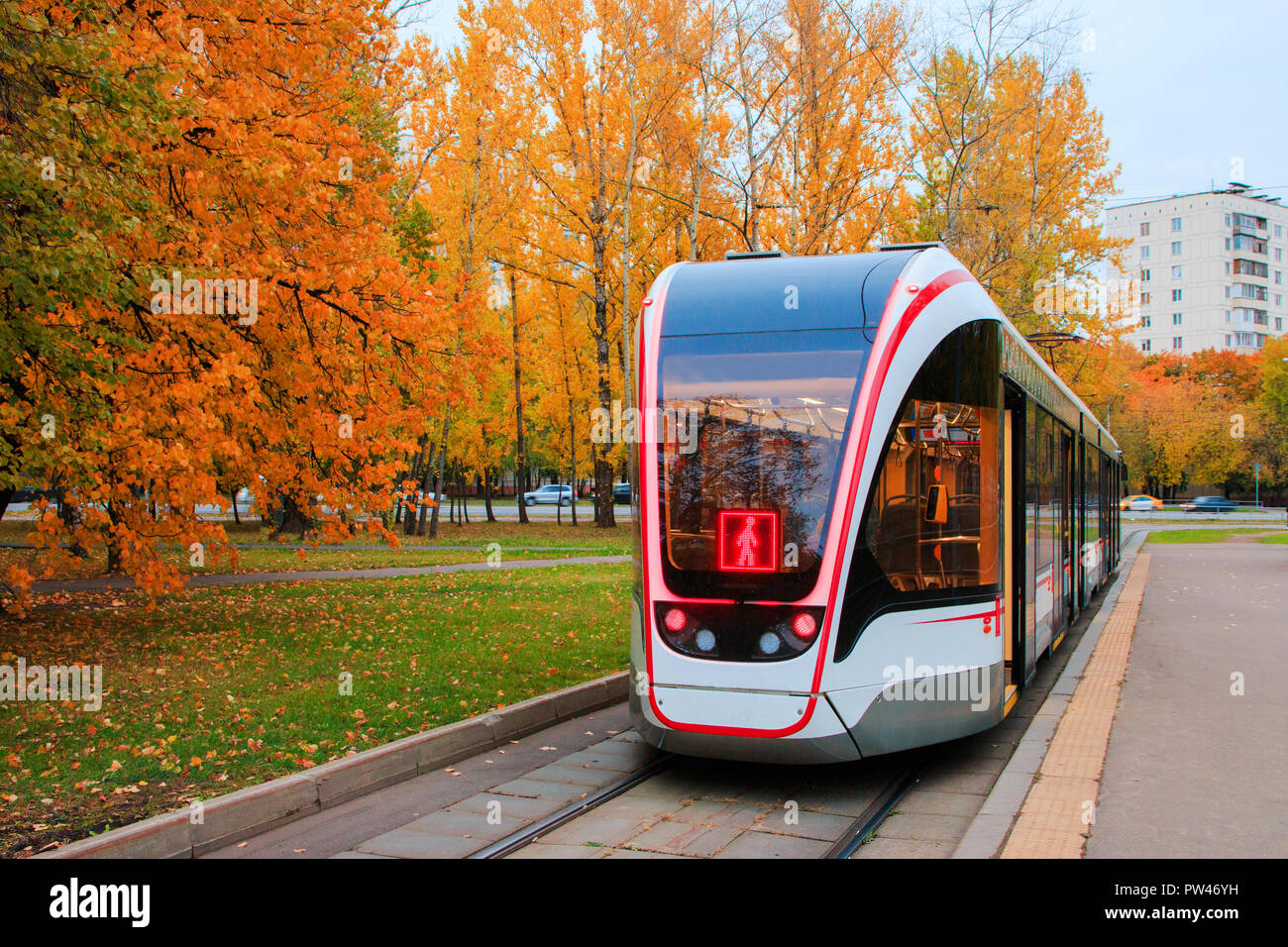 public transport, modern city tram, approaching the bus stop Moscow ...