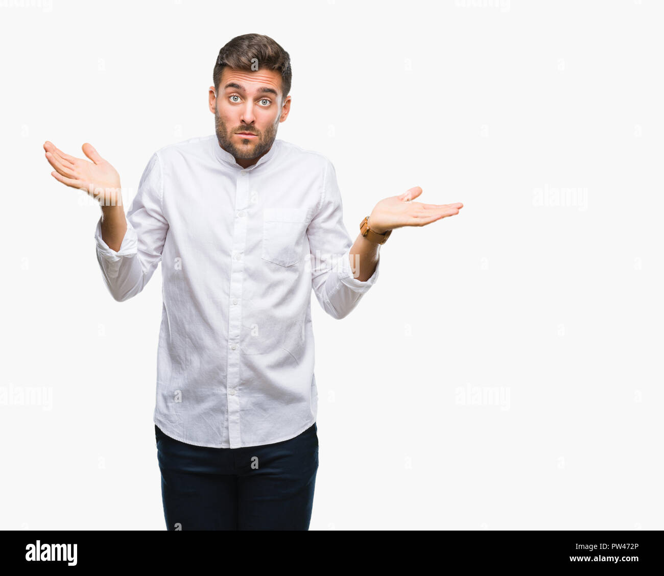 Young handsome man over isolated background clueless and confused ...