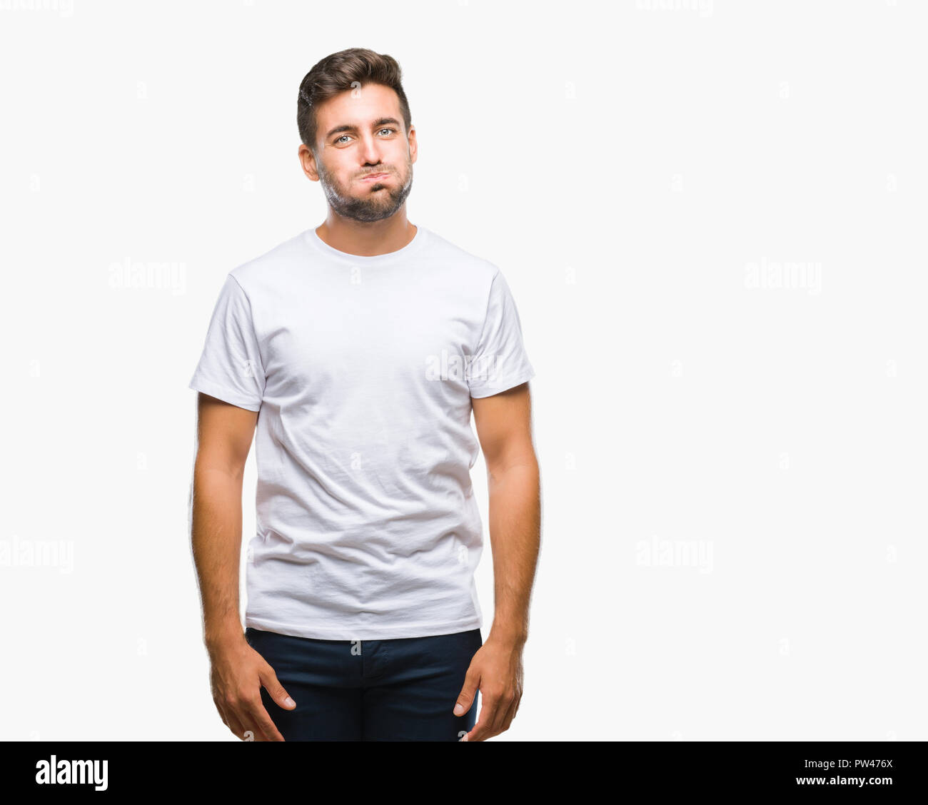 Young handsome man over isolated background puffing cheeks with funny ...