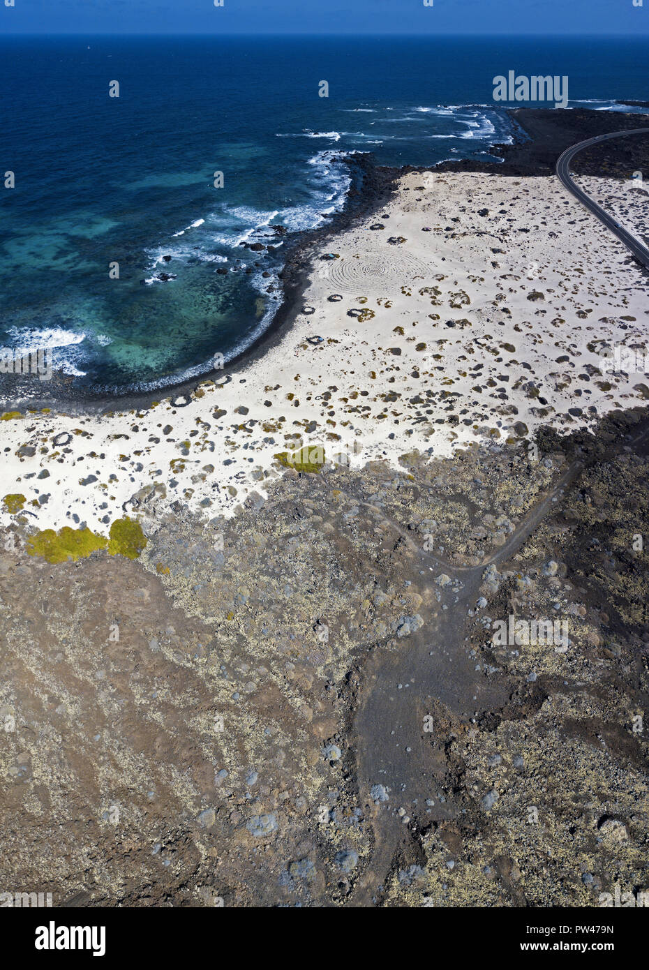 Aerial view of the Spiral Caleta, spiral beach, pebbles on the ground ...