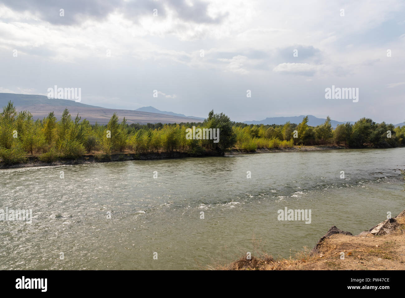 Mtkvari river, near the cave city of Uplistsikhe ,Shida Kartli Region ...