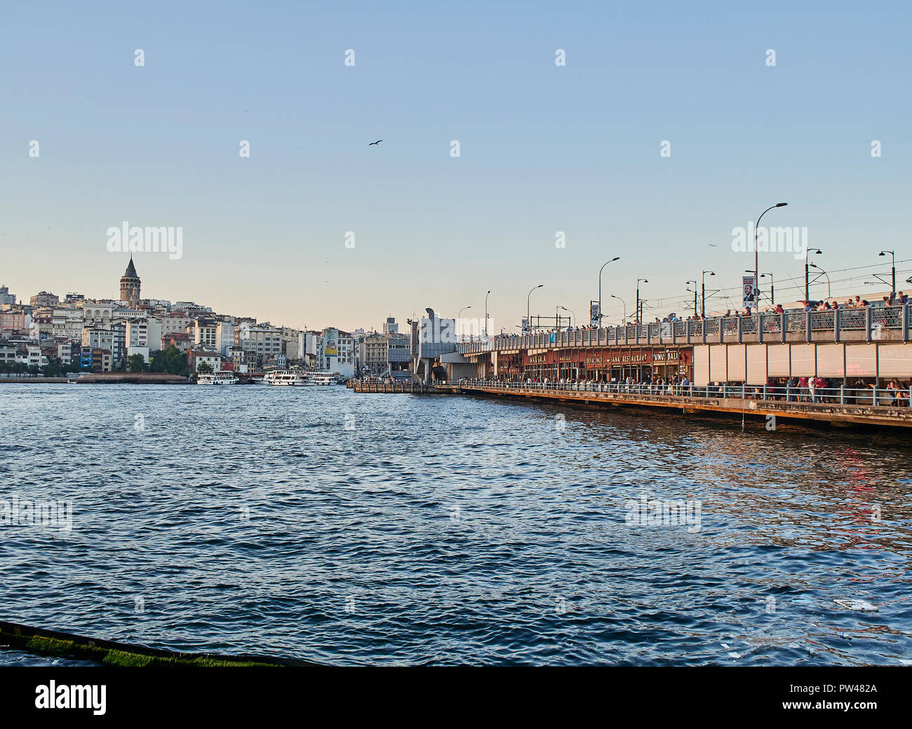 The Galata bridge over the mouth of the Golden Horn Bay in the ...