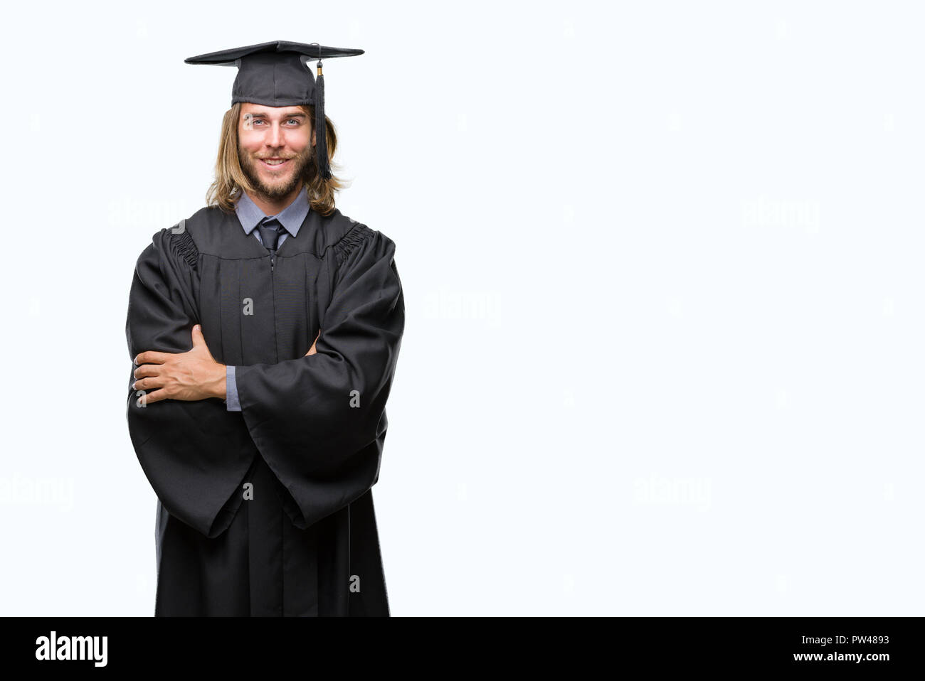 Young handsome graduated man with long hair over isolated background ...