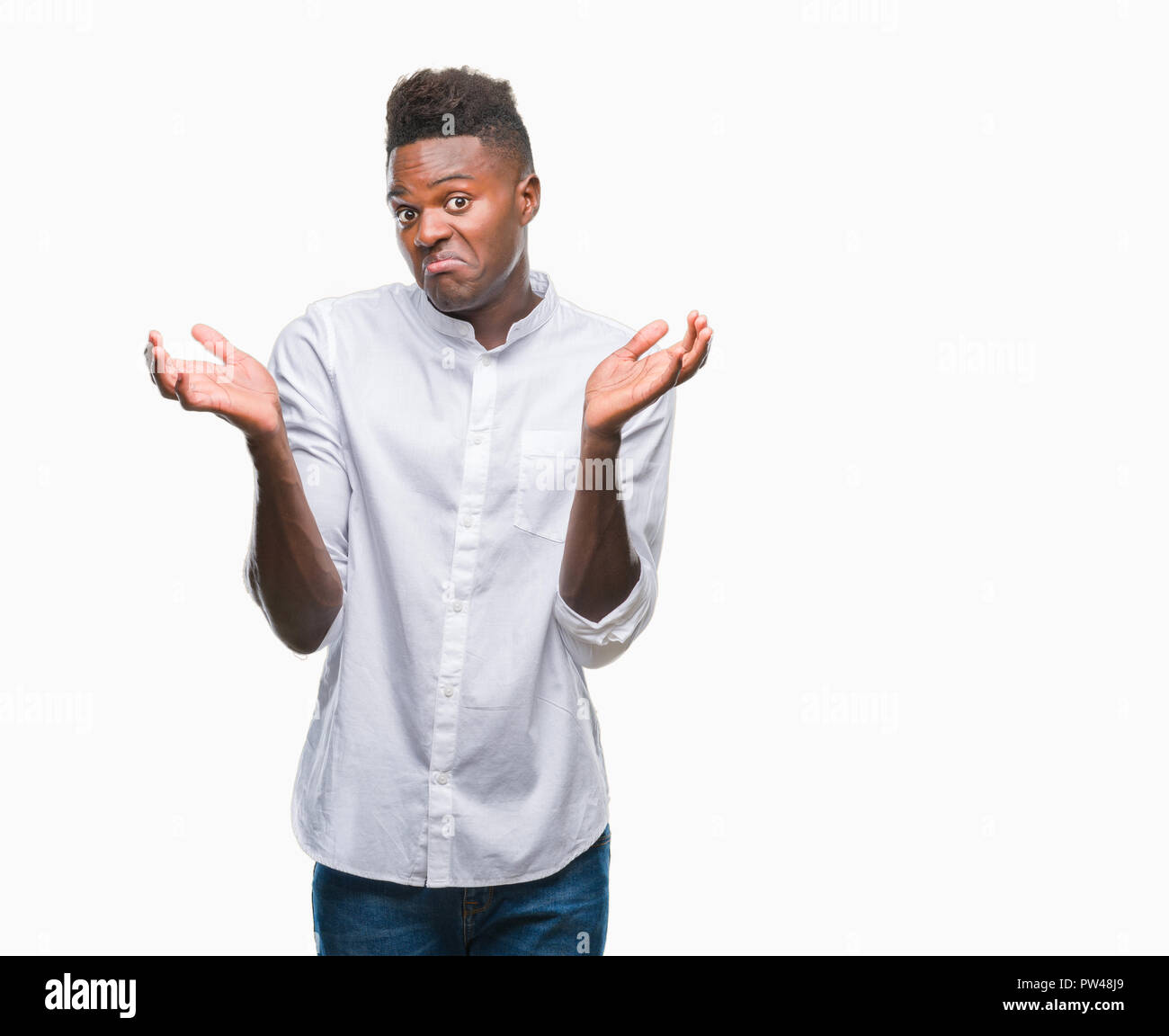 Young african american man over isolated background clueless and ...