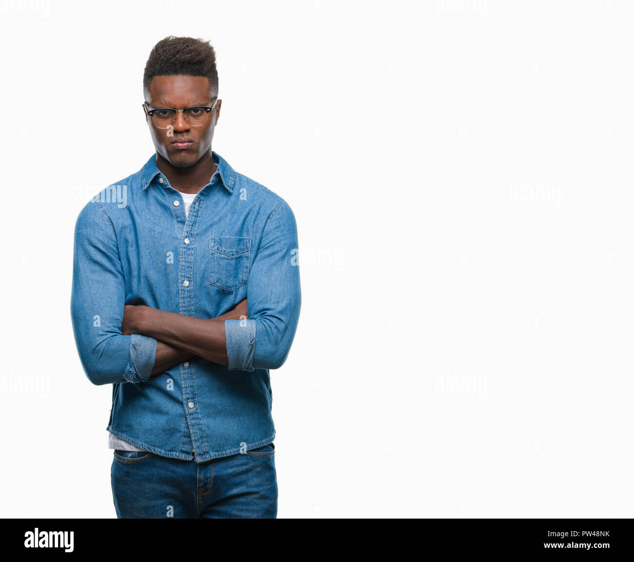 Young african american man over isolated background skeptic and nervous ...